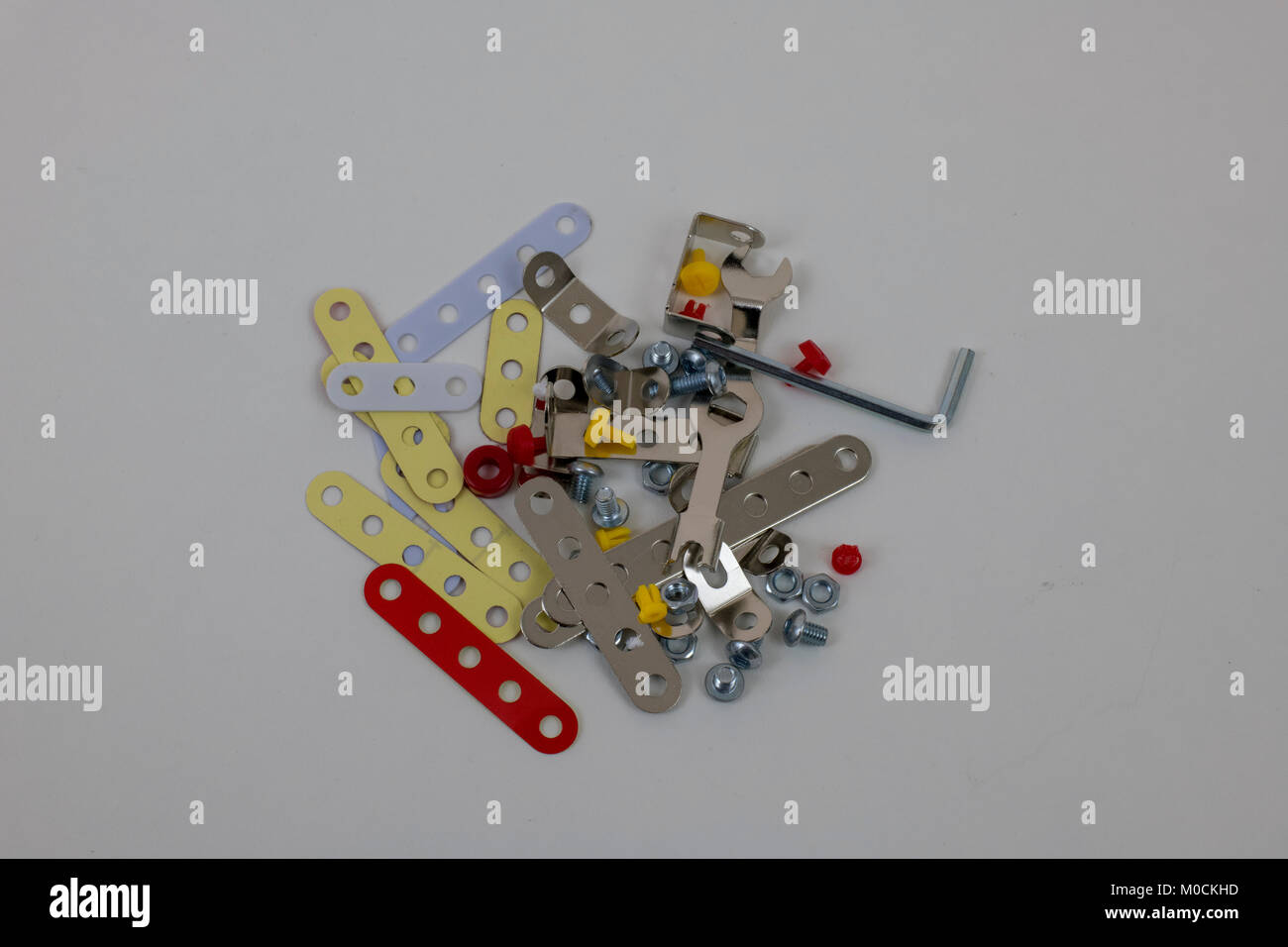 Collection of metal toy construction parts Stock Photo - Alamy