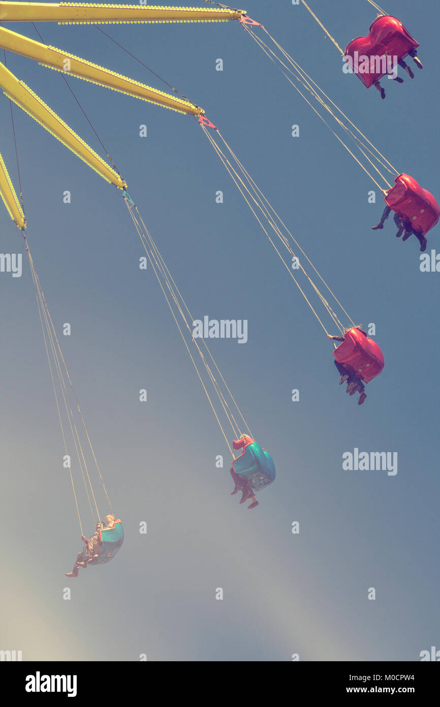 Amusement park chairoplane in the sky Stock Photo - Alamy