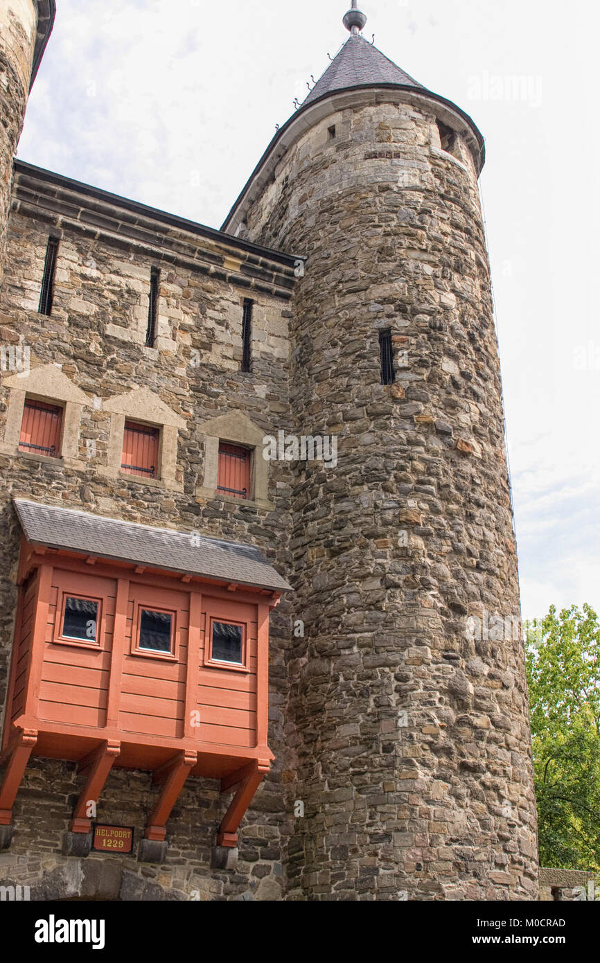Medieval tower and gate with wooden outbuilding for the guards. The ...