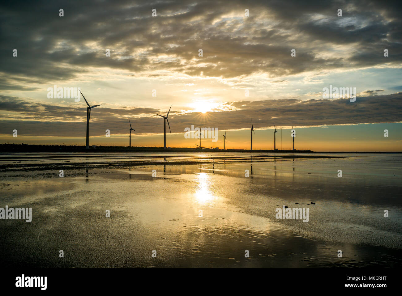 sillouette of Wind turbine array at Gaomei Wetland Stock Photo - Alamy