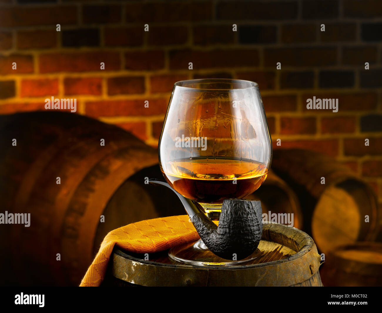cognac poured in a glass Stock Photo - Alamy