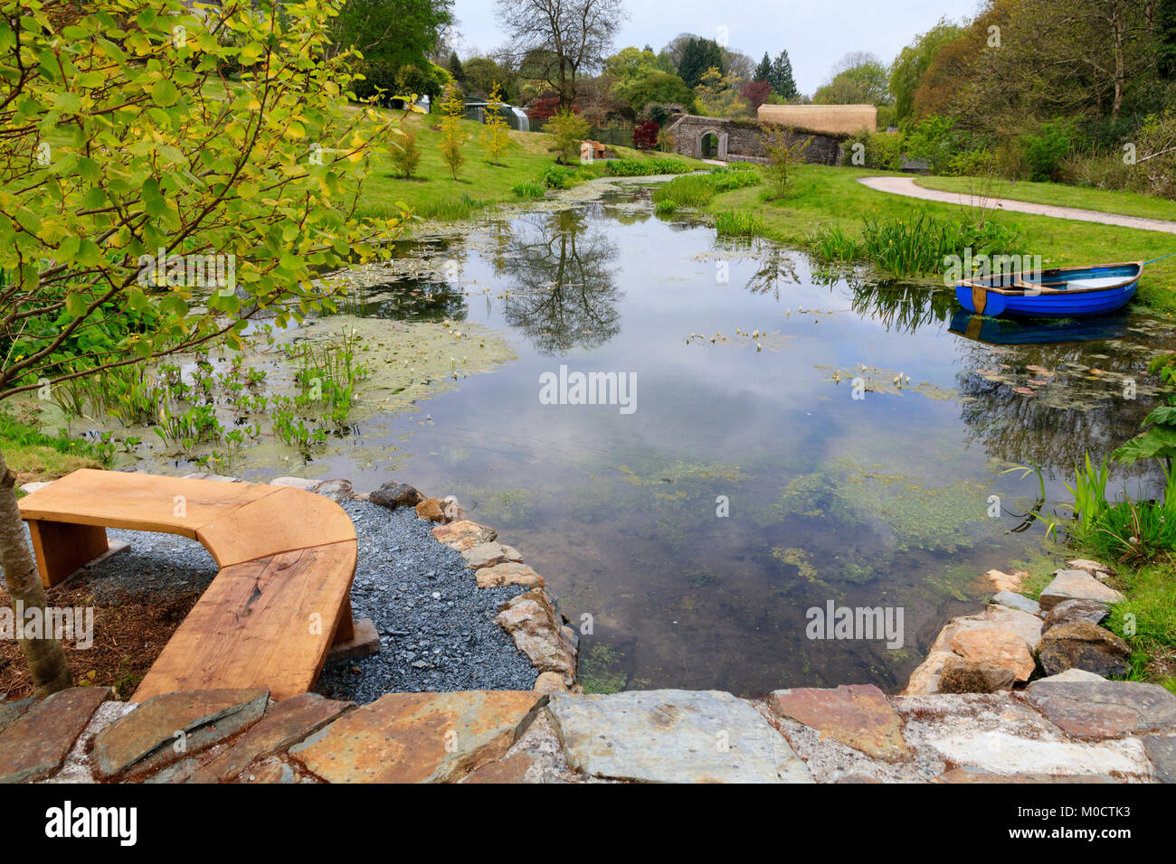View across the lake and arboretum at The Garden House, Buckland ...
