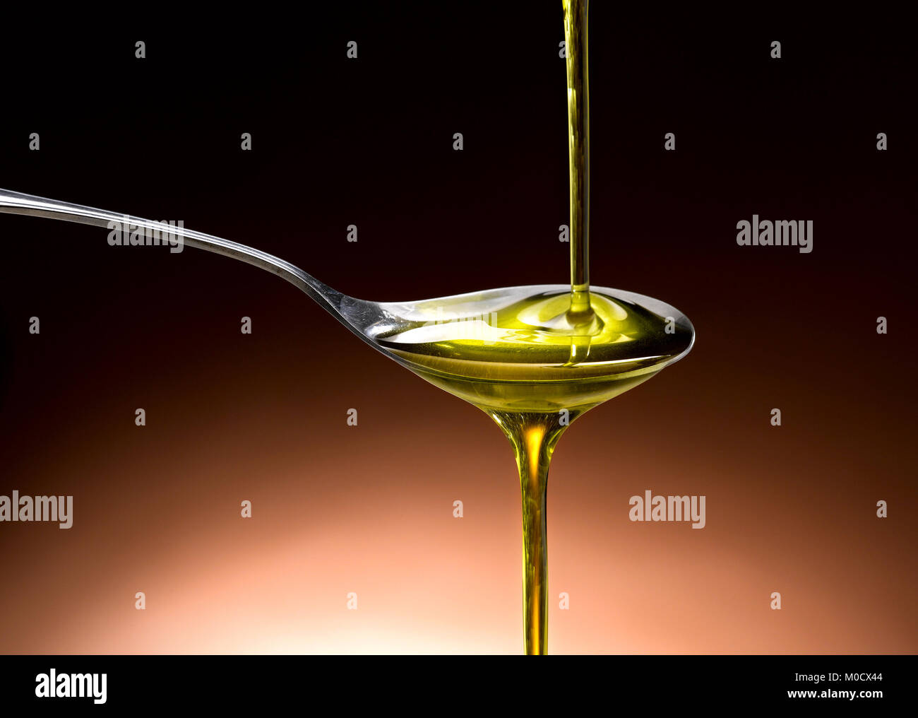 extra virgin olive oil poured in all its forms Stock Photo - Alamy