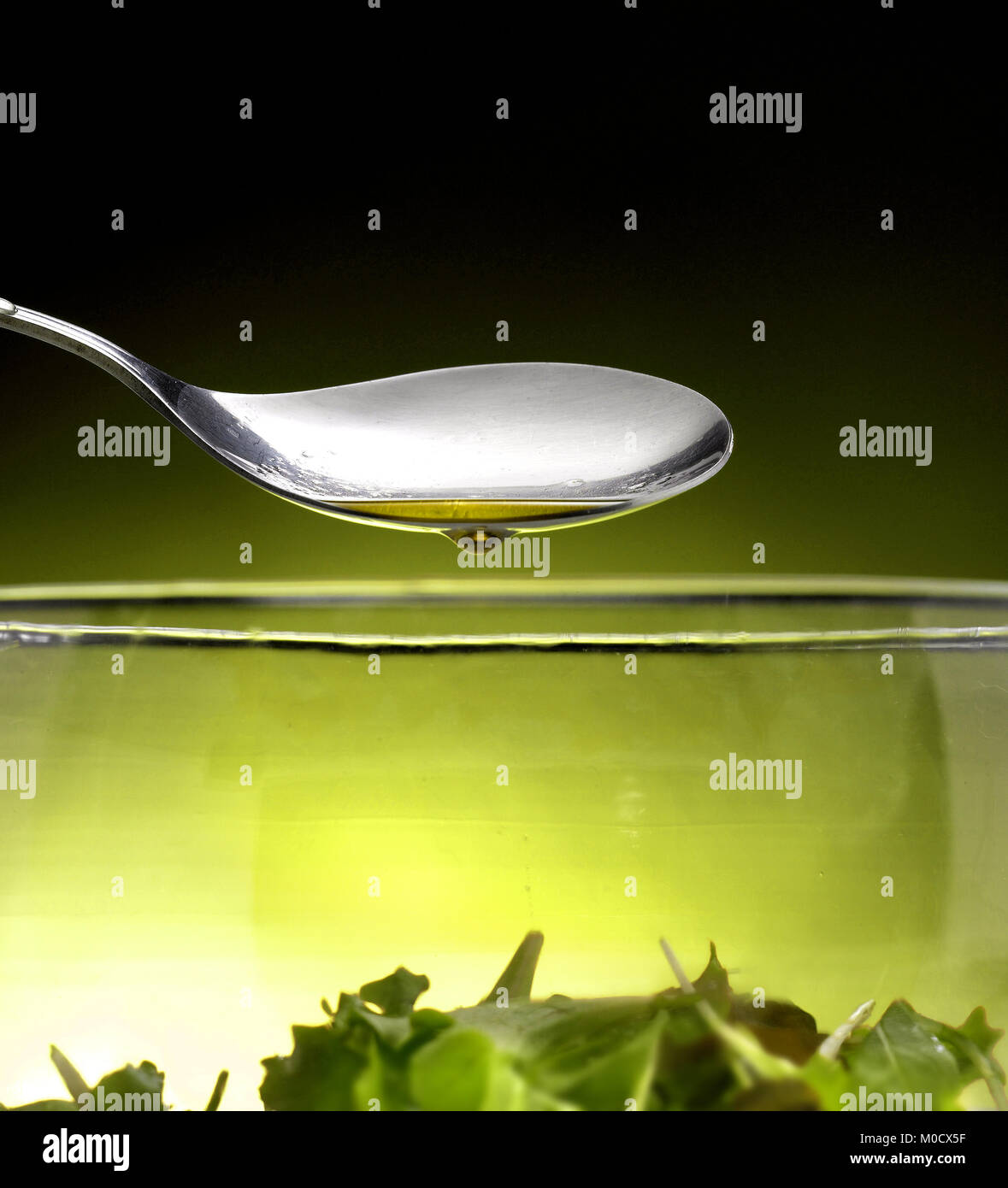 extra virgin olive oil poured in all its forms Stock Photo - Alamy