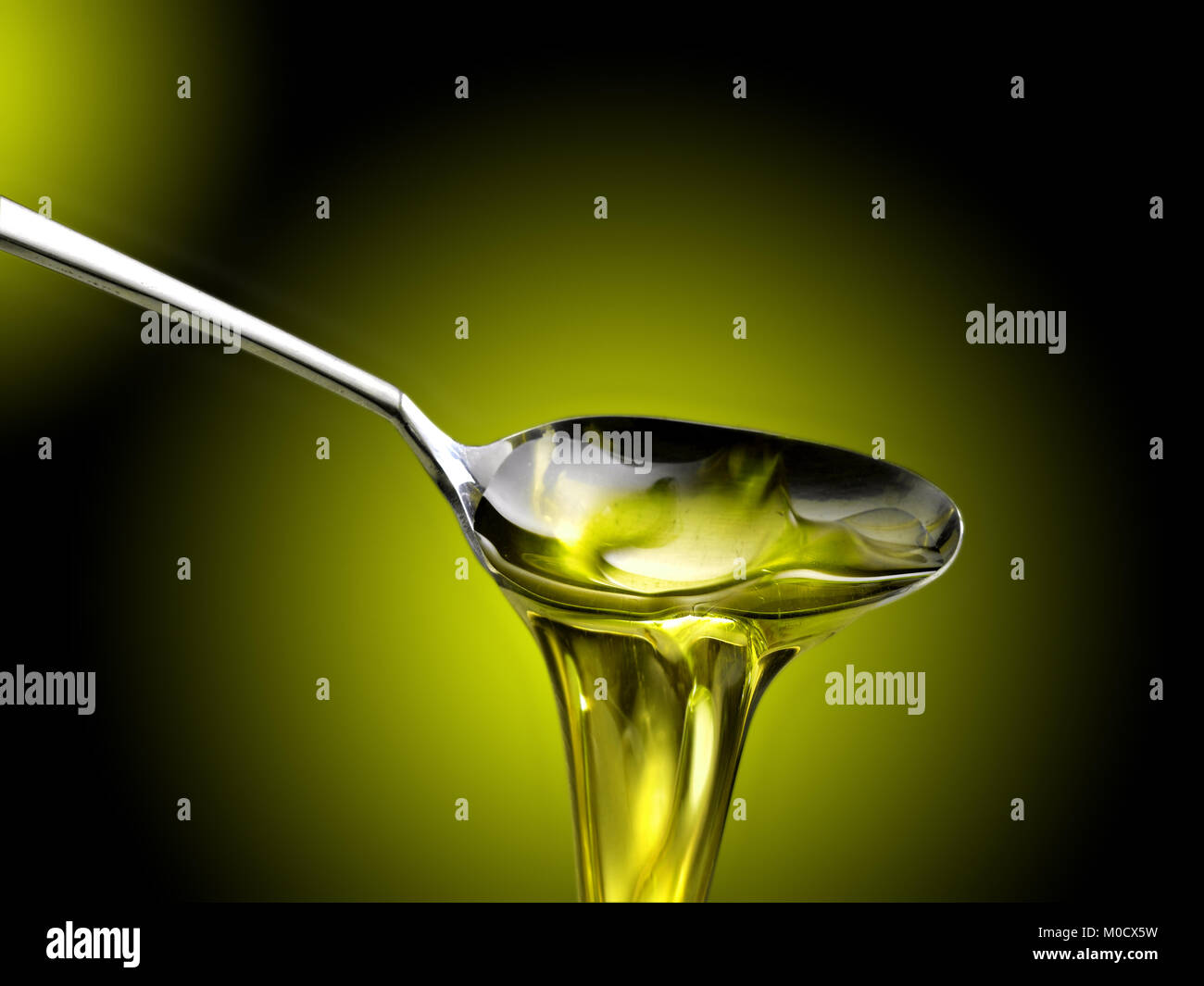 extra virgin olive oil poured in all its forms Stock Photo - Alamy