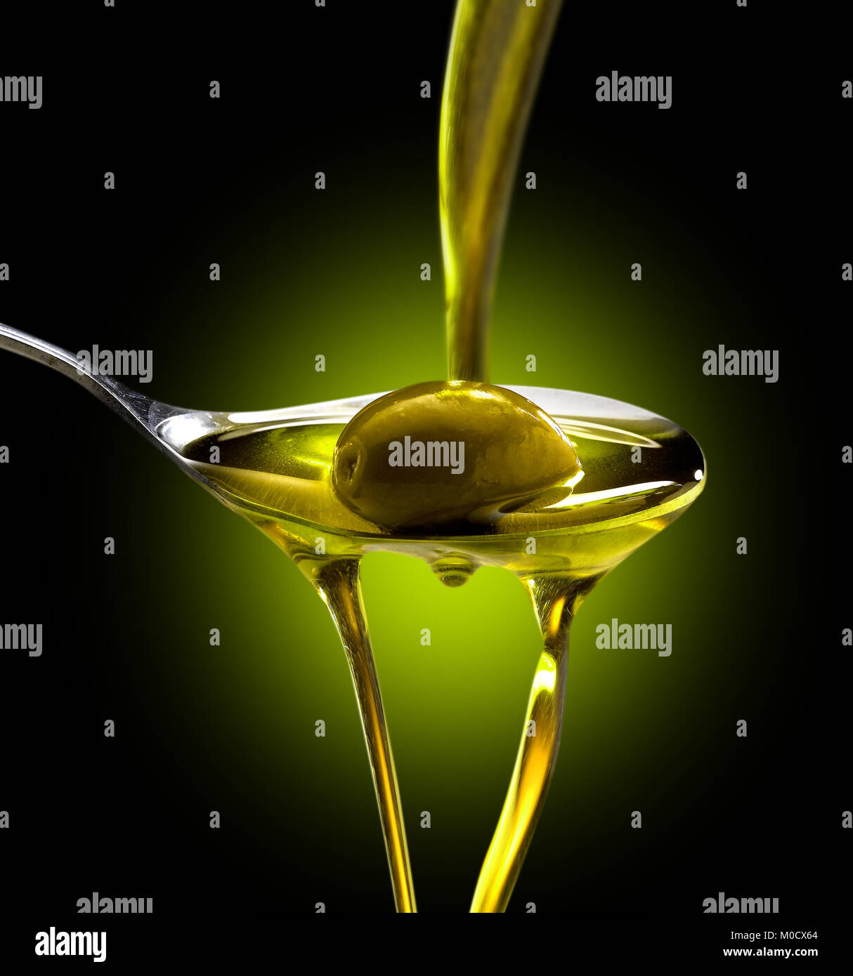 extra virgin olive oil poured in all its forms Stock Photo - Alamy