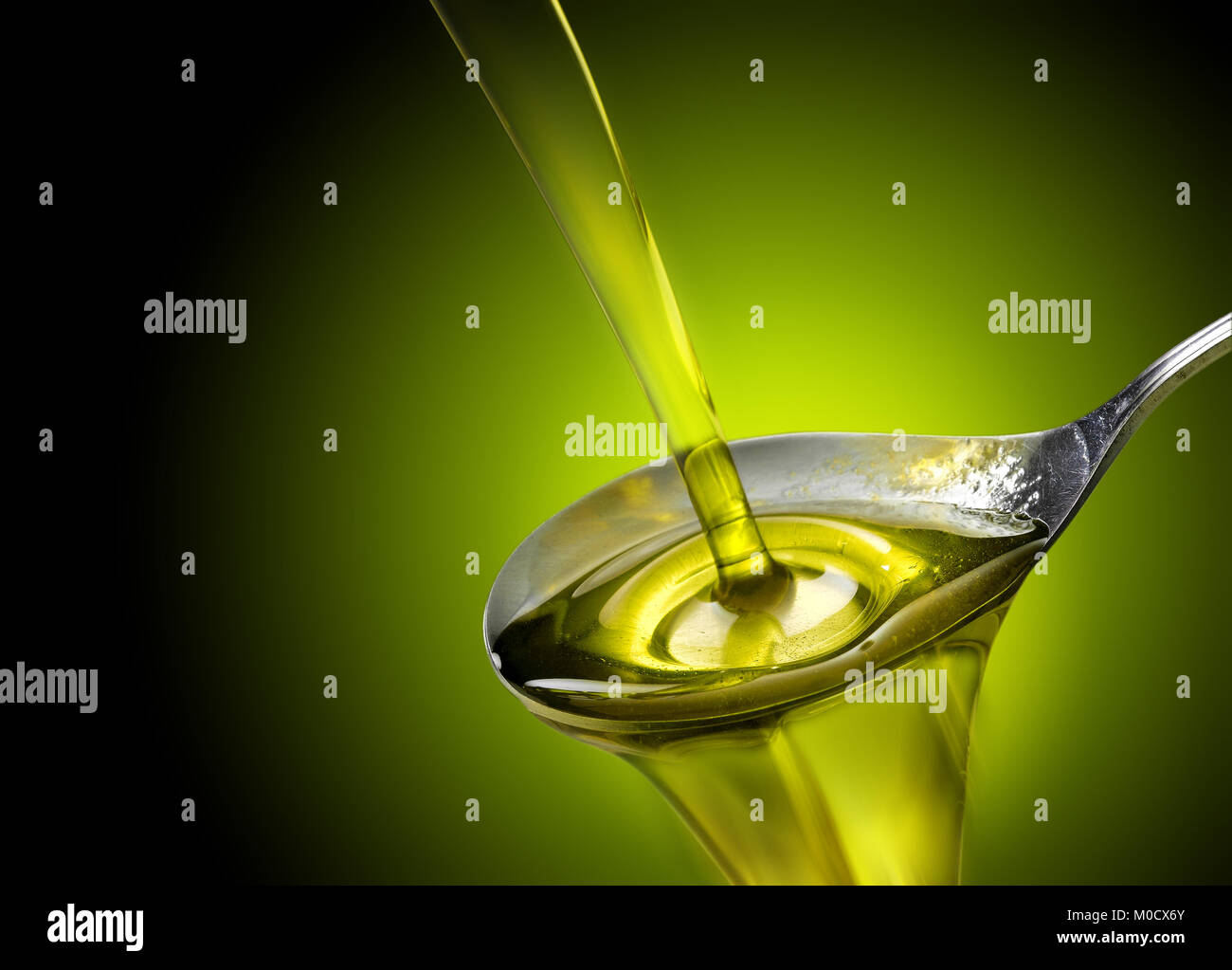 extra virgin olive oil poured in all its forms Stock Photo - Alamy