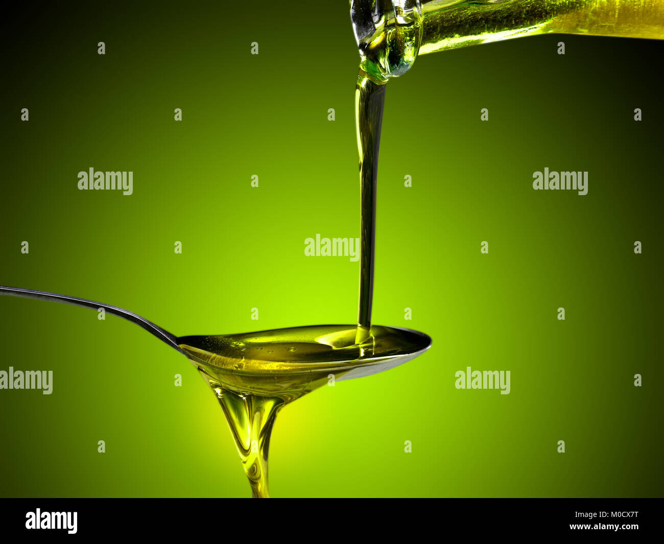 extra virgin olive oil poured in all its forms Stock Photo - Alamy