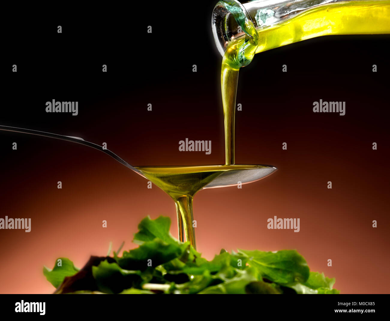 extra virgin olive oil poured in all its forms Stock Photo - Alamy