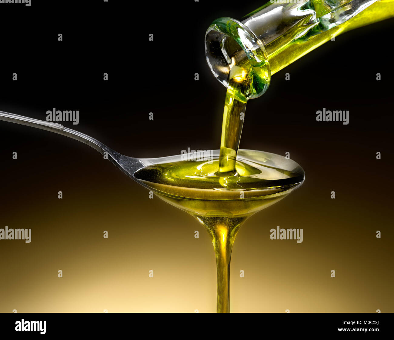 extra virgin olive oil poured in all its forms Stock Photo - Alamy