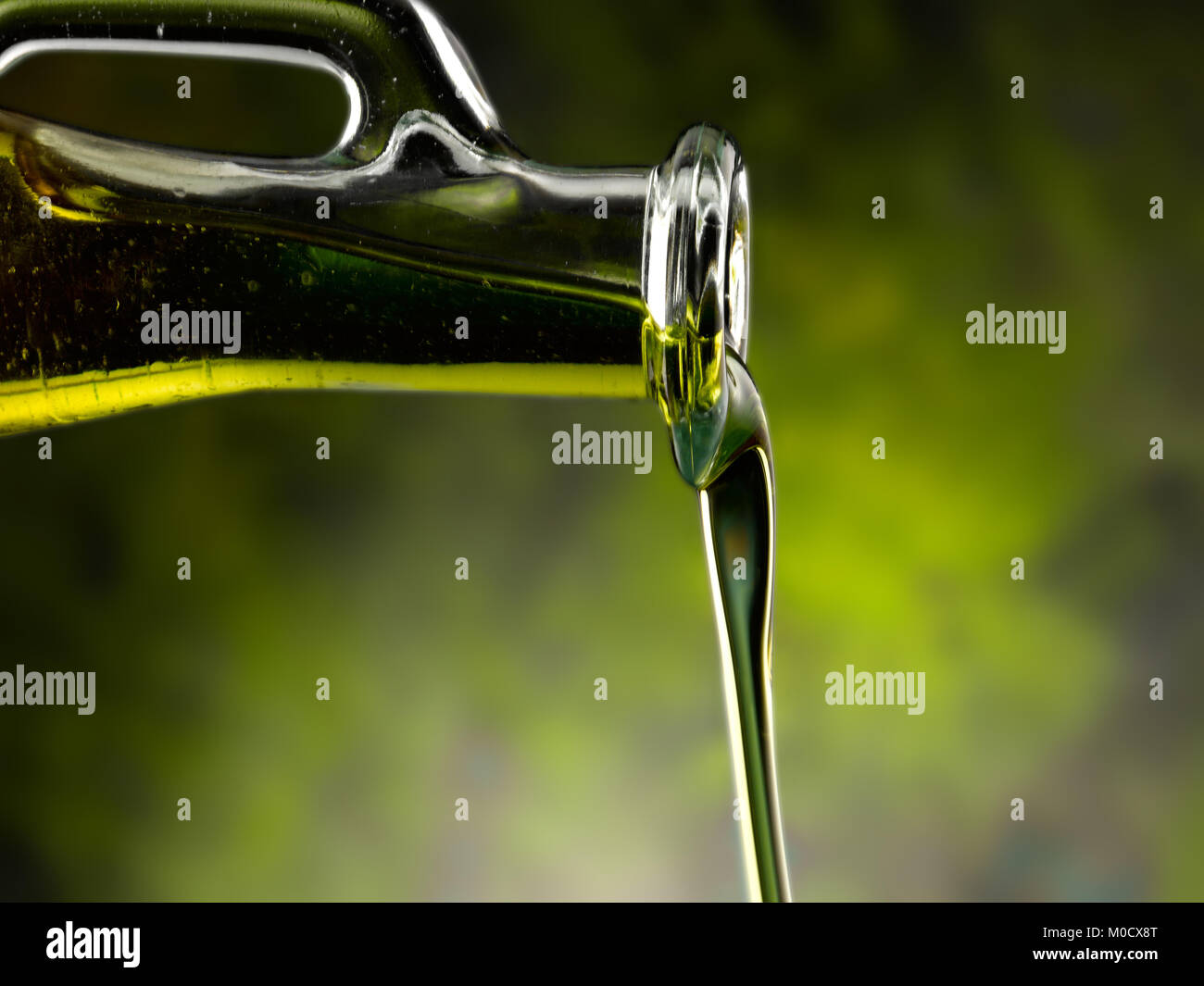 extra virgin olive oil poured in all its forms Stock Photo - Alamy