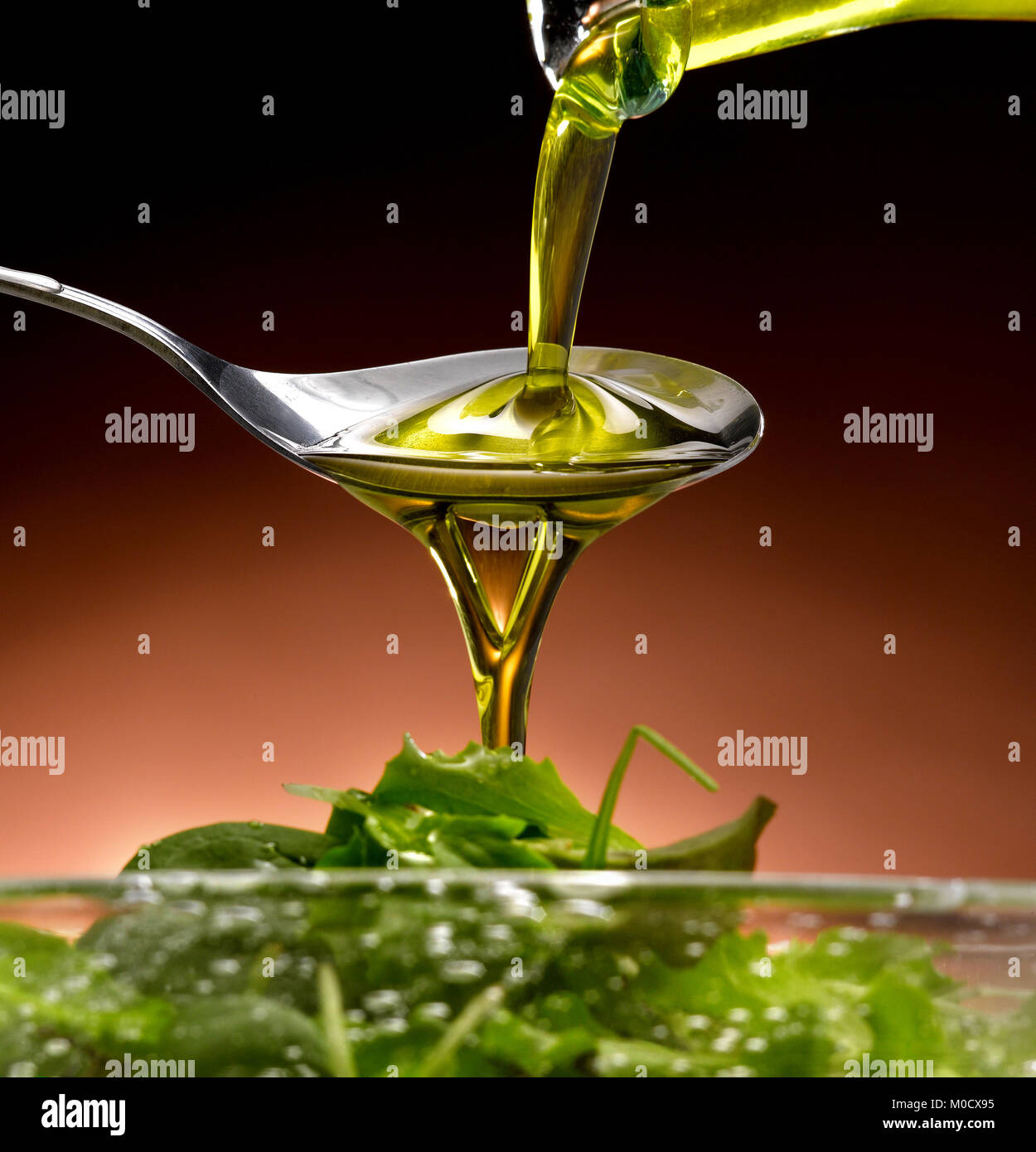 extra virgin olive oil poured in all its forms Stock Photo - Alamy