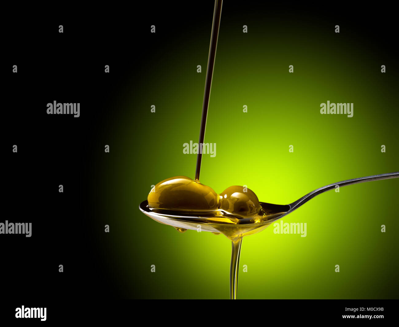 extra virgin olive oil poured in all its forms Stock Photo - Alamy