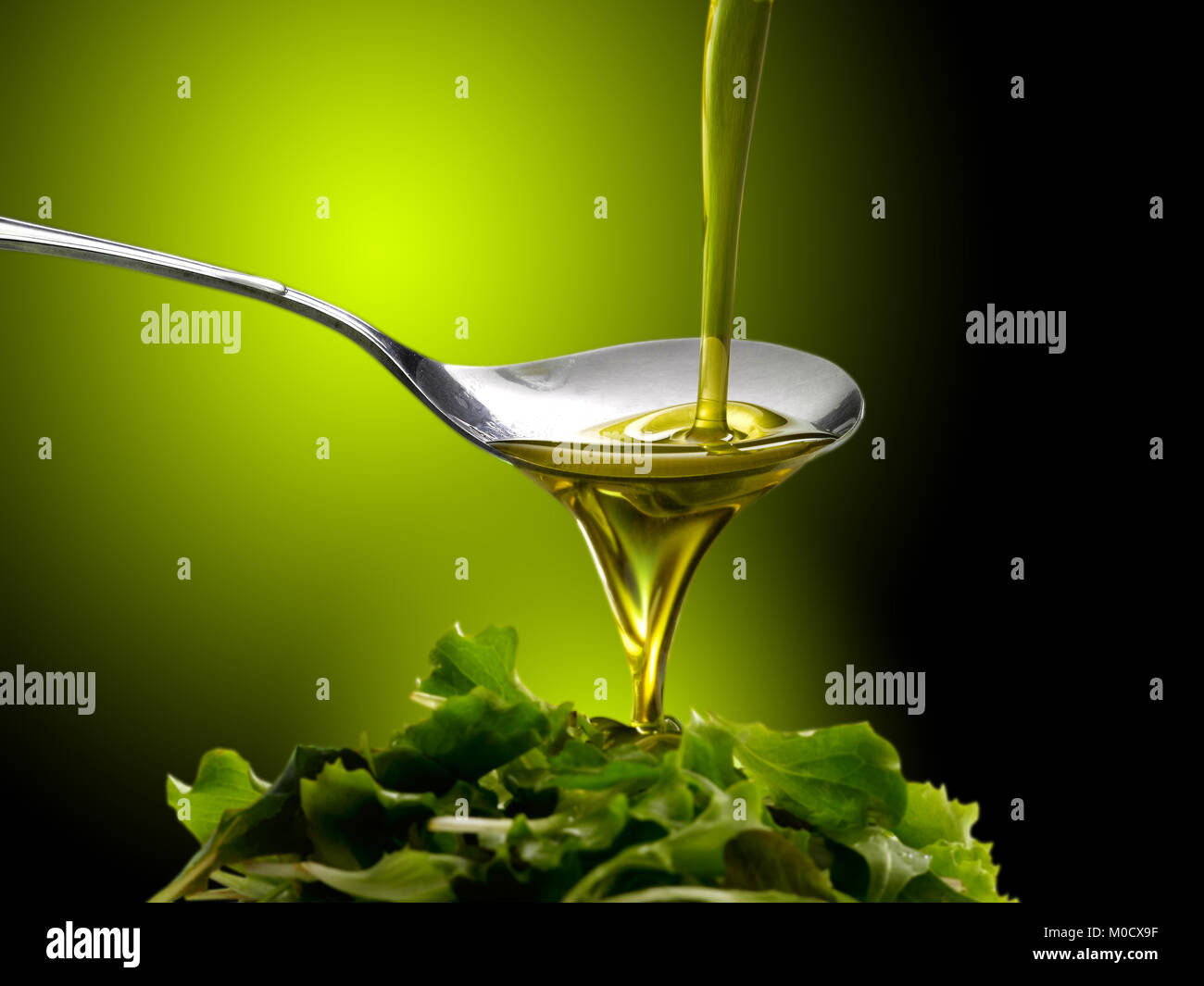 extra virgin olive oil poured in all its forms Stock Photo - Alamy