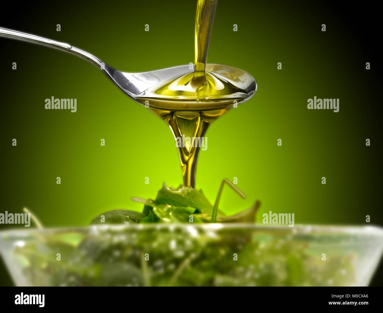 extra virgin olive oil poured in all its forms Stock Photo - Alamy
