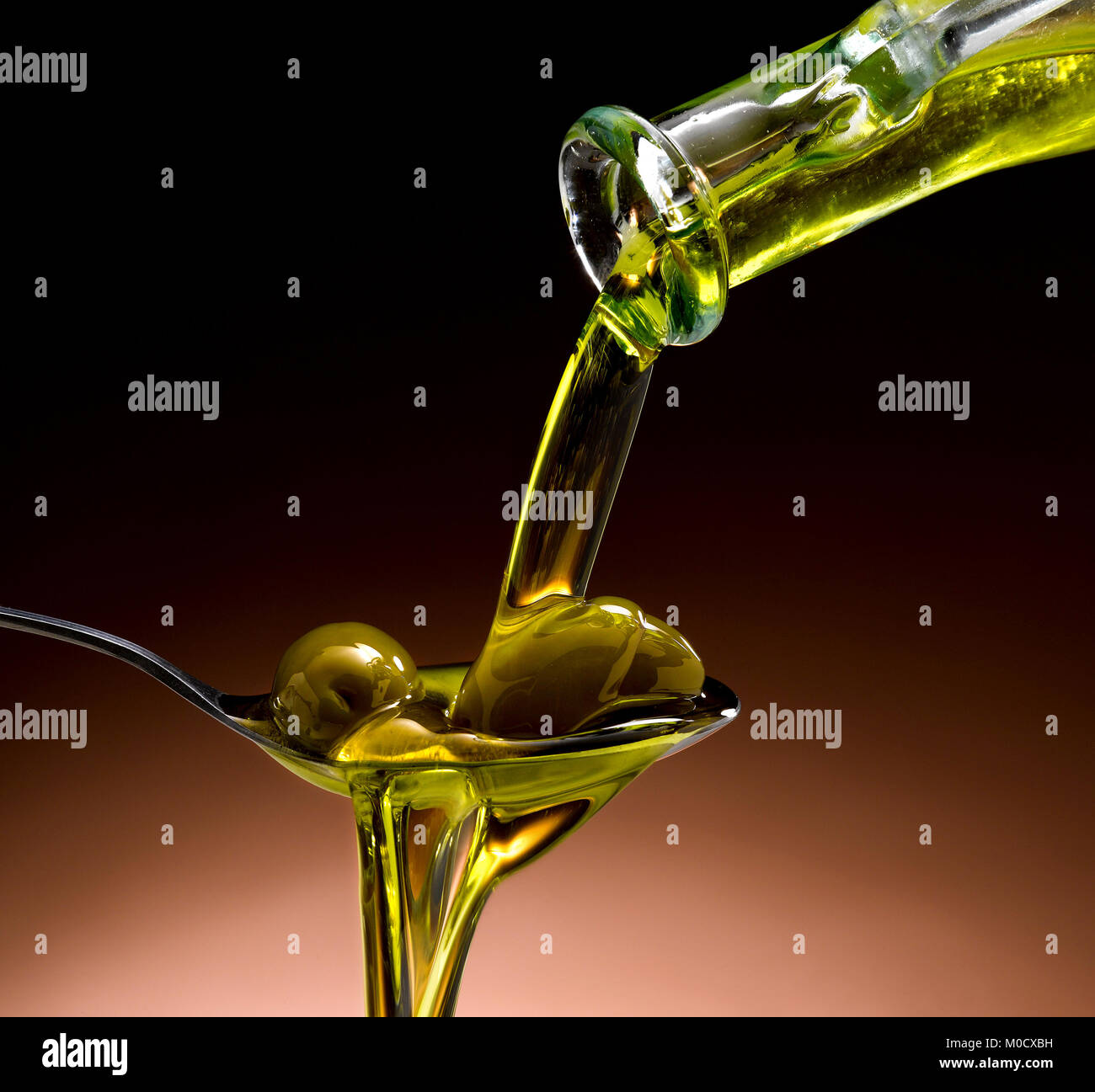 extra virgin olive oil poured in all its forms Stock Photo - Alamy
