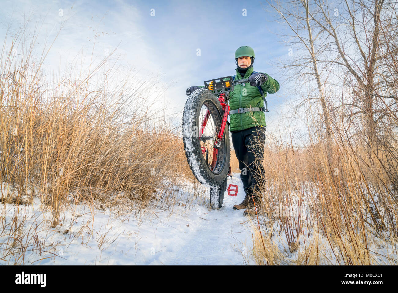 riding a fat mountain bike in winter, cold day in Colorado Stock Photo ...