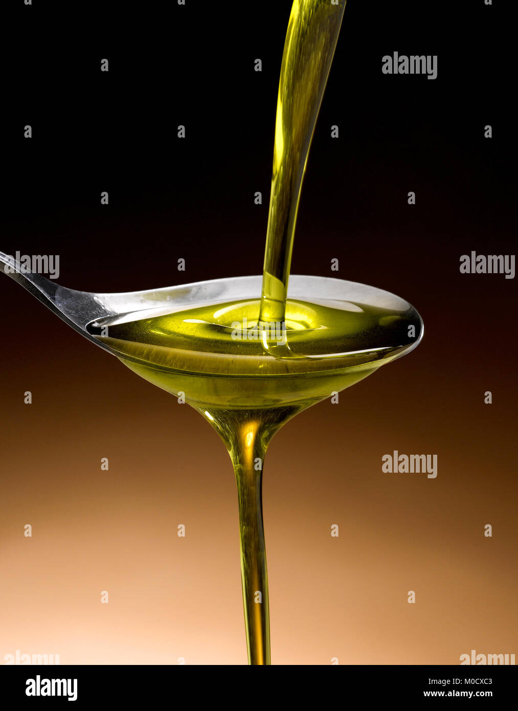 extra virgin olive oil poured in all its forms Stock Photo - Alamy
