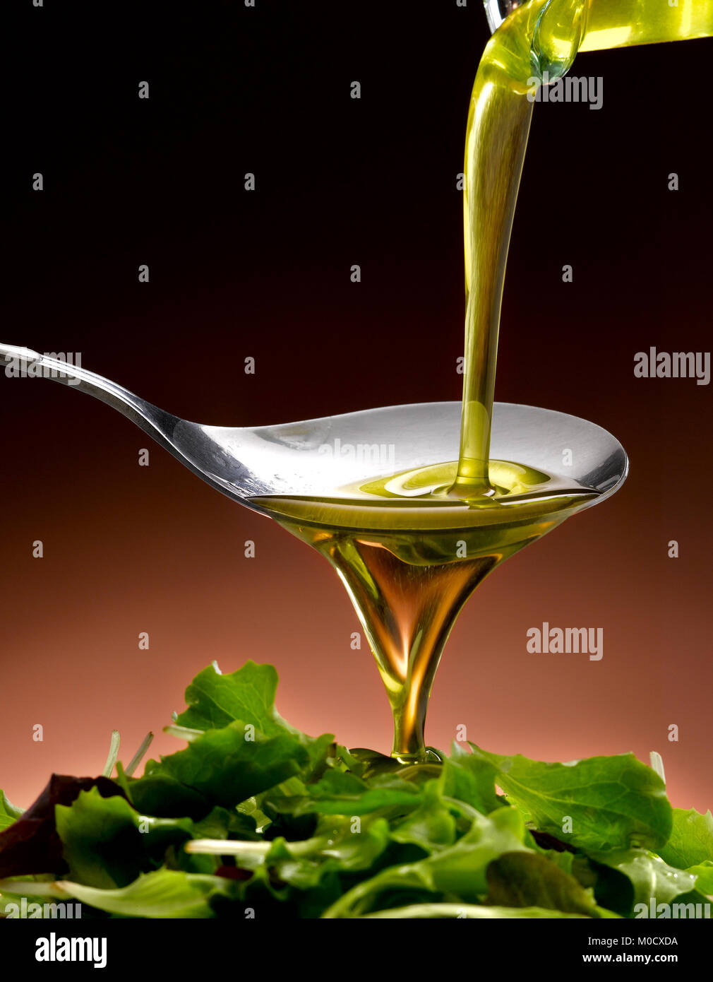 extra virgin olive oil poured in all its forms Stock Photo - Alamy