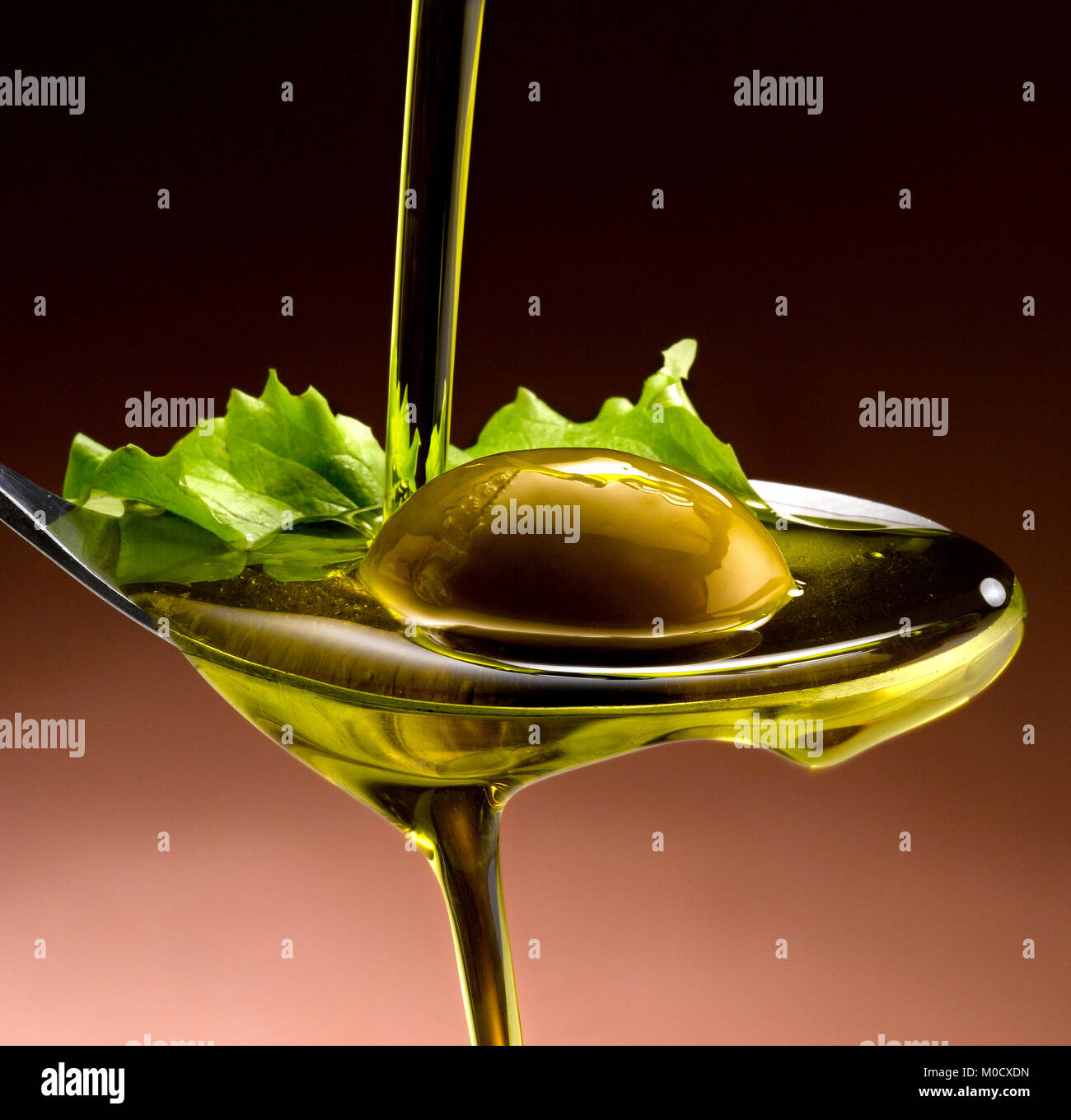 extra virgin olive oil poured in all its forms Stock Photo - Alamy