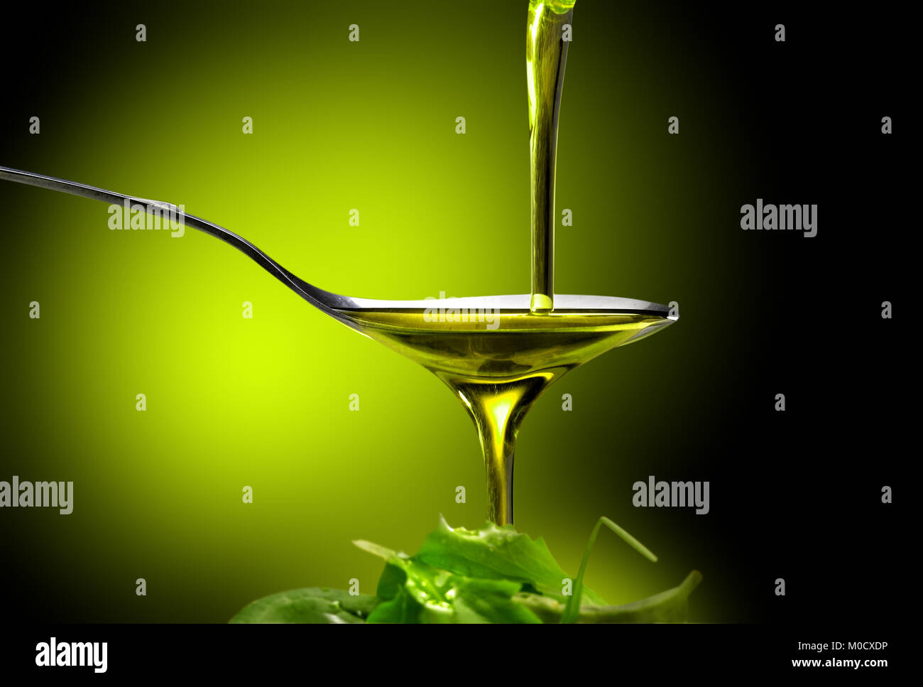 extra virgin olive oil poured in all its forms Stock Photo - Alamy
