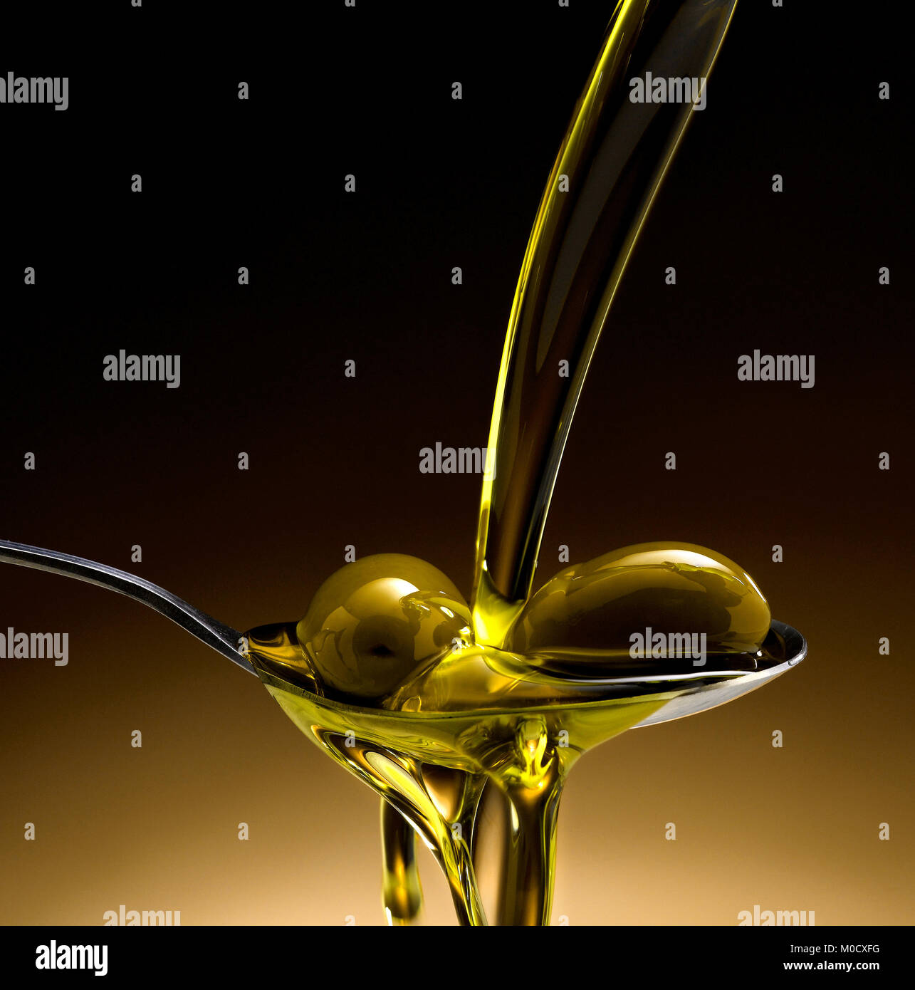 extra virgin olive oil poured in all its forms Stock Photo - Alamy