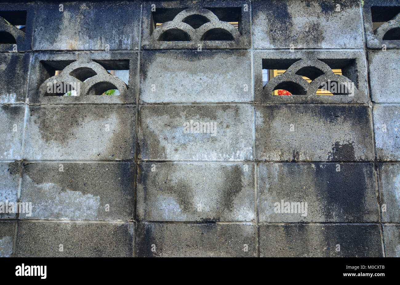 Stone wall with small windows of ancient building Stock Photo - Alamy