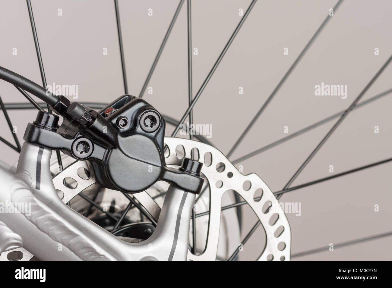 Hydraulic rear disc brake of mountain bike, close up view, studio photo ...