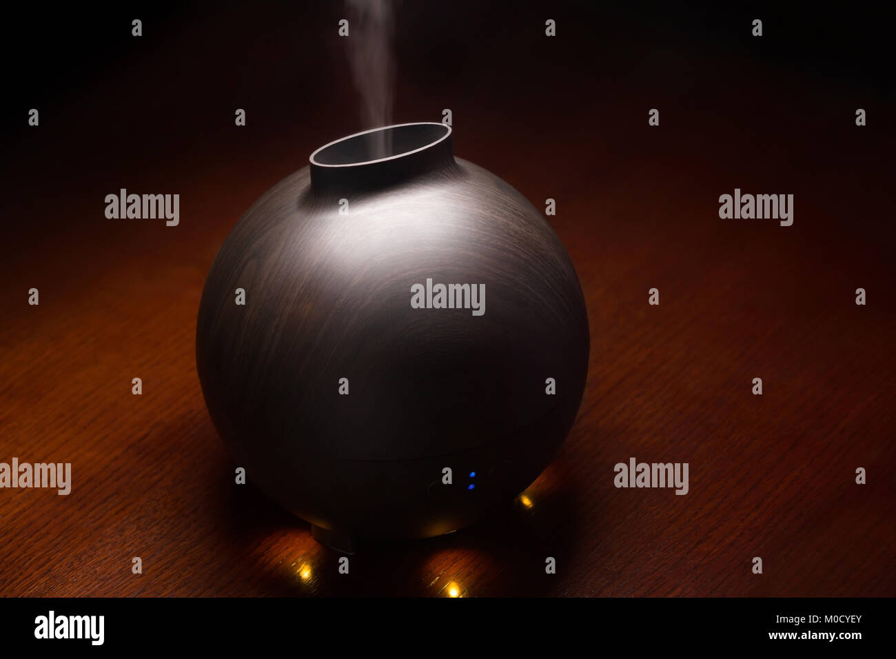 Spa Electric Aroma Diffuser with Wood Finish Stock Photo - Alamy