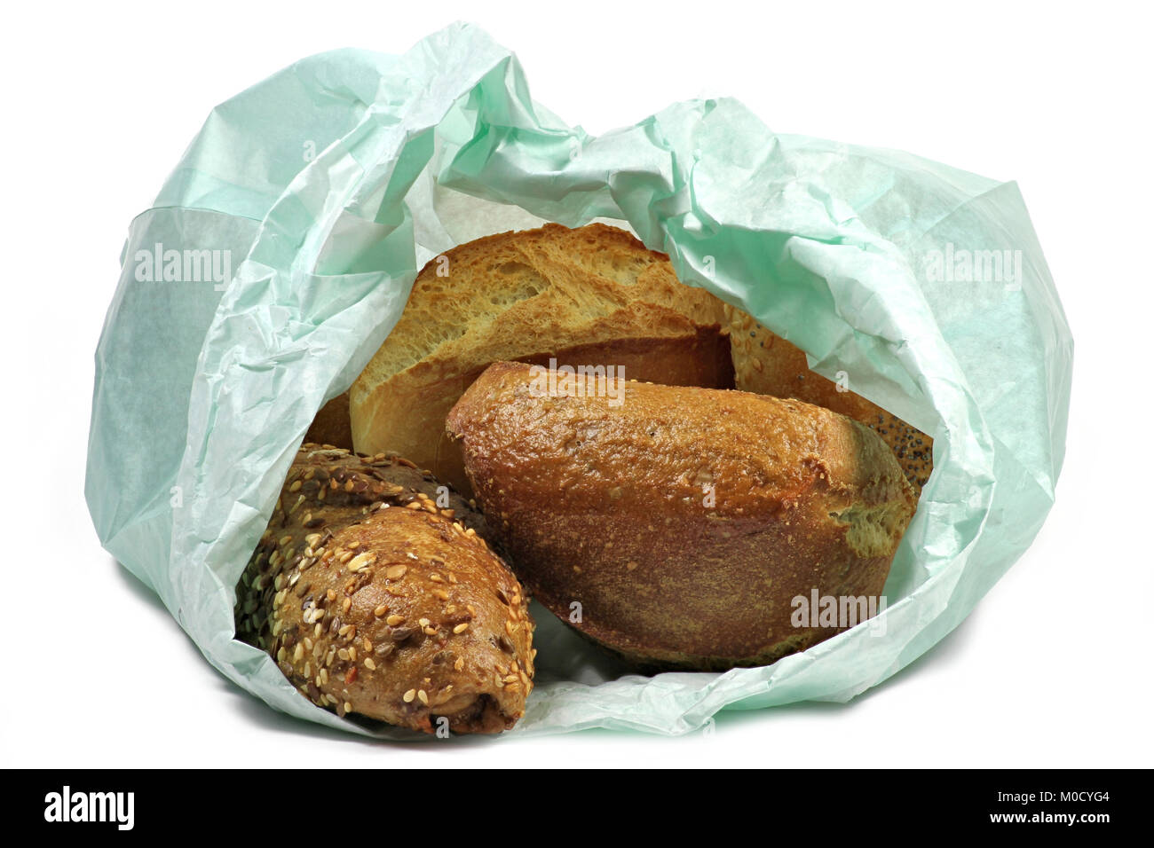 fresh German style bread rolls in paper bag isolated on white ...