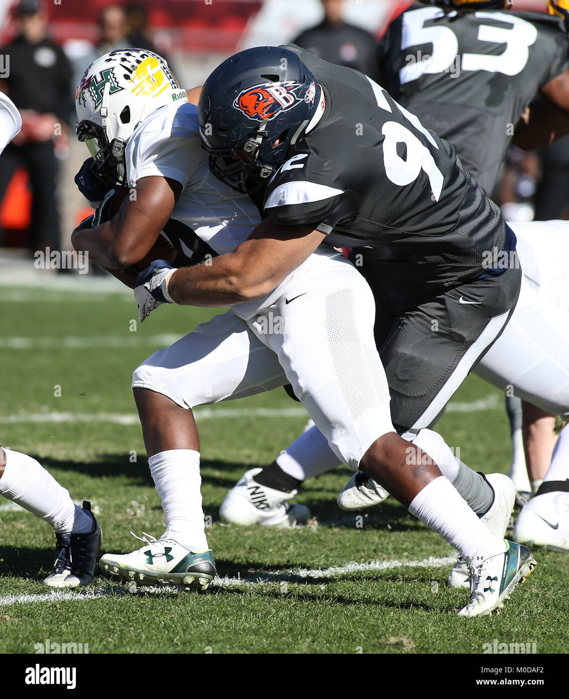 Collegiate football tackle hi-res stock photography and images - Alamy