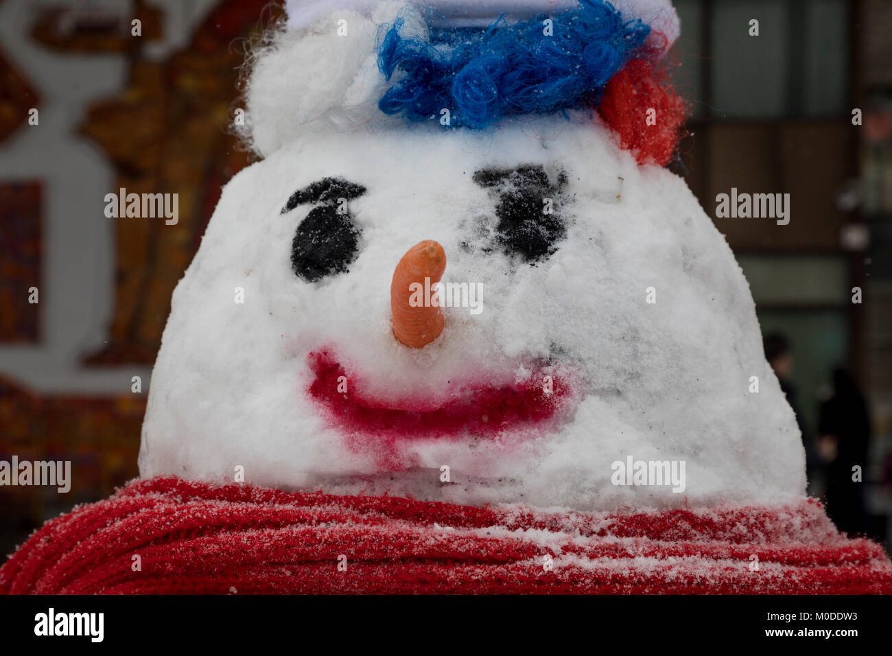 a smart snowman stands in the park on the new year's eve in Moscow ...