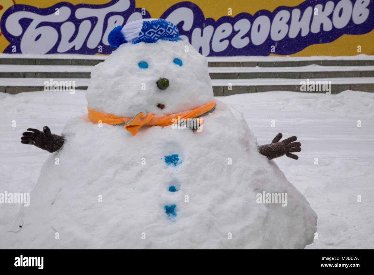 A snowman stands in the park during the art battle of snowmen on the ...