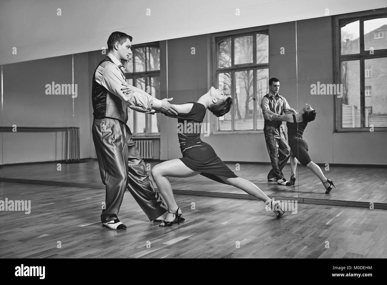 beautiful couple dancing tango Stock Photo - Alamy