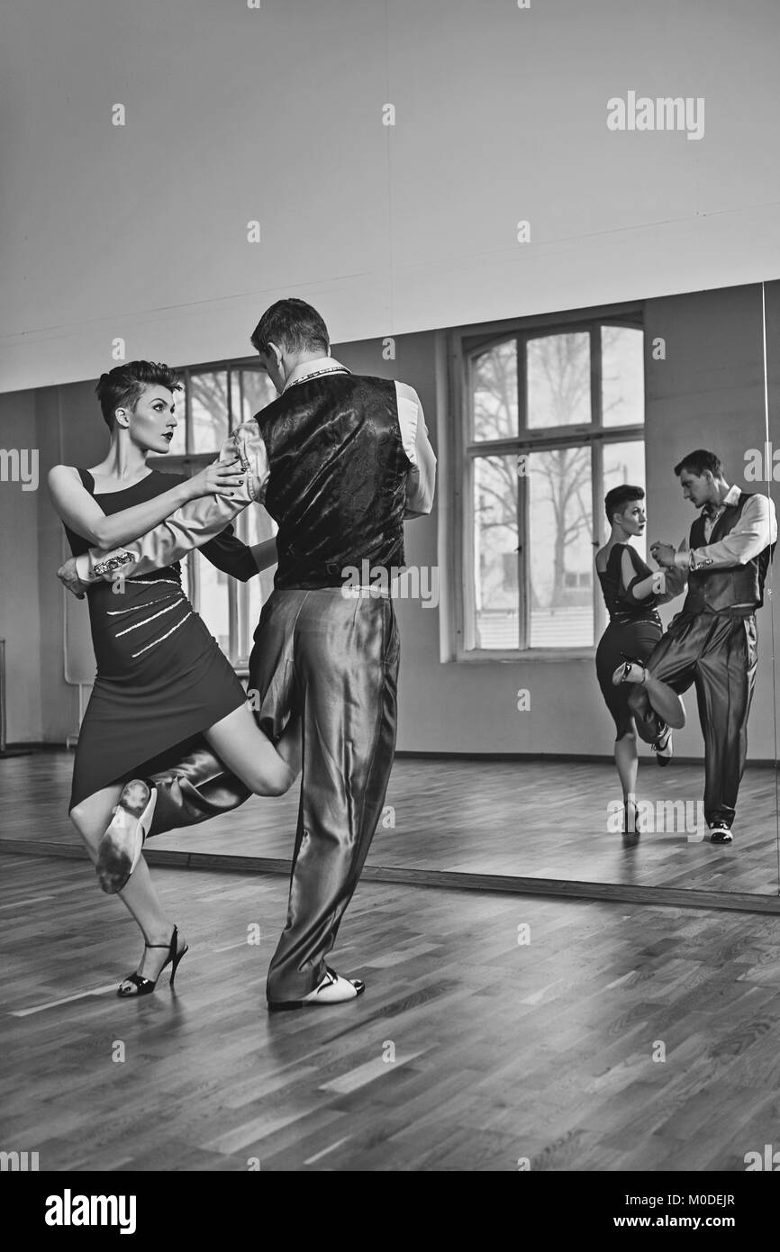 Attractive male and female dancing tango Black and White Stock Photos & Images - Alamy