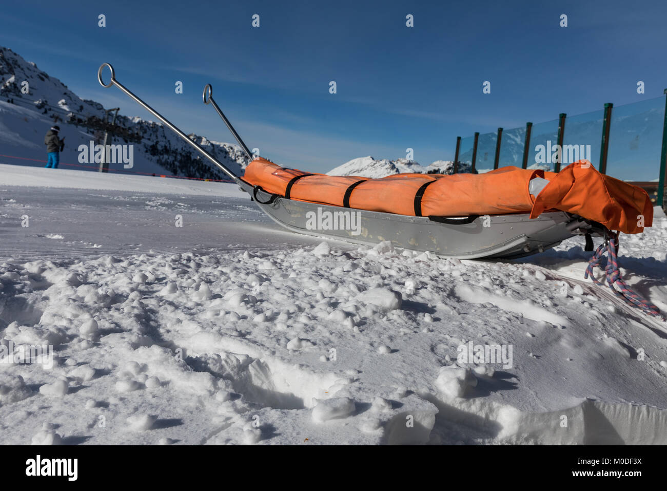 Rescue sled in the snow. Transport sleigh for injured skiers. Prepare ...