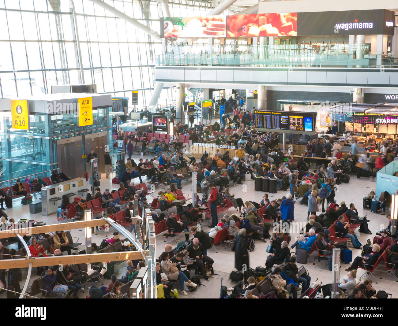 UK, London, Heathrow airport, terminal 5. 12/28/2017. The busy terminal ...