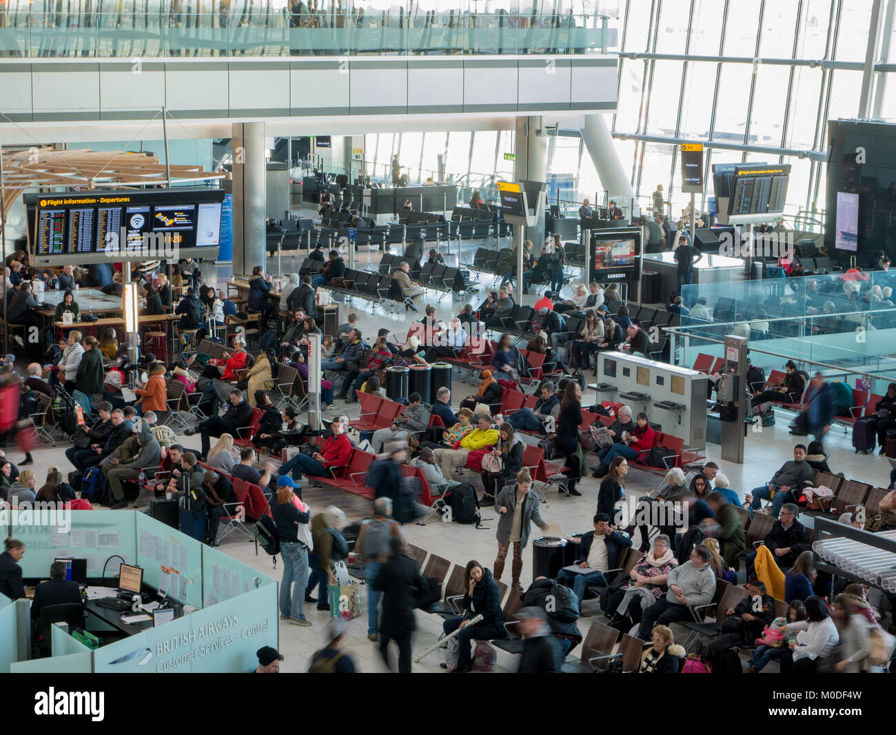 UK, London, Heathrow airport, terminal 5. 12/28/2017. The busy terminal ...