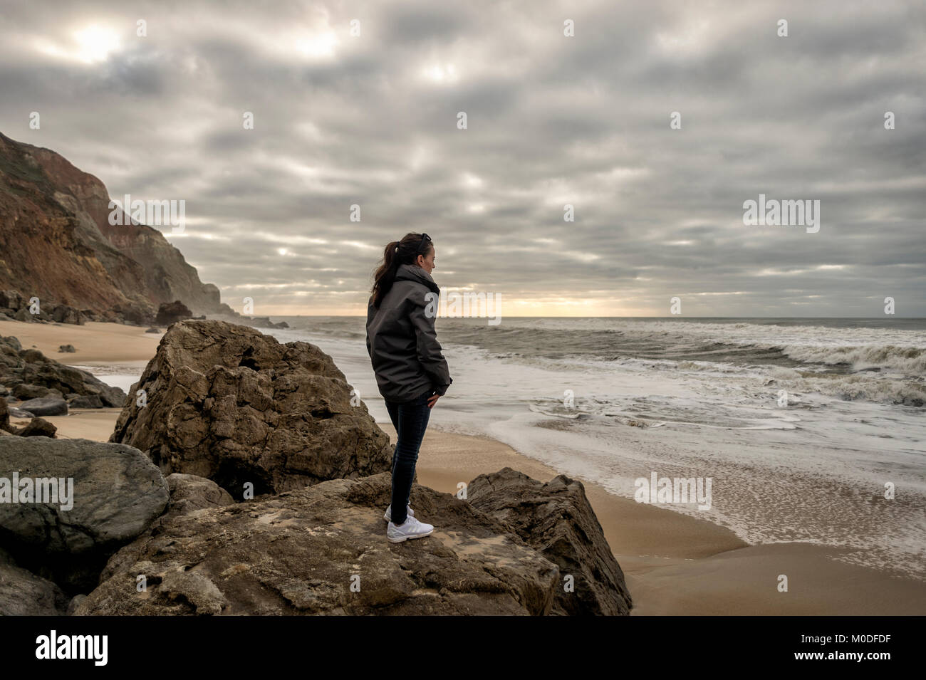 Woman looking out ocean waves hi-res stock photography and images - Alamy