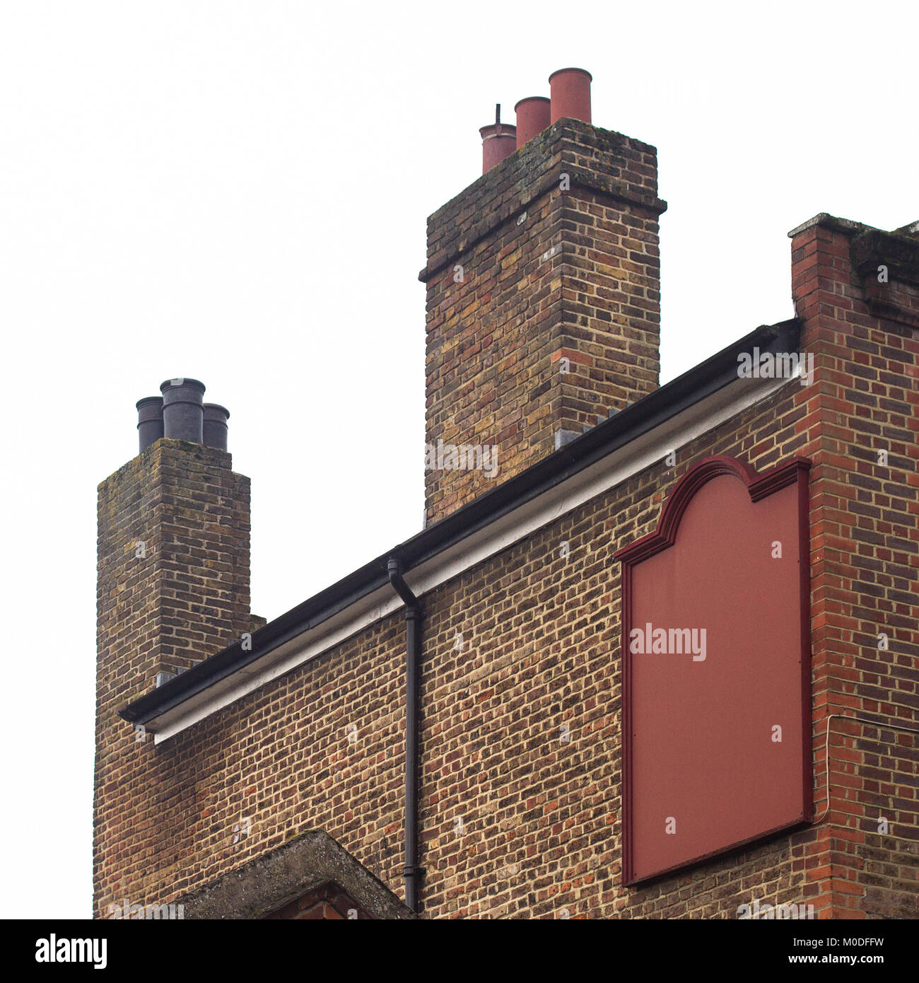 Horizontal side view of empty square signage on a brick decorated ...