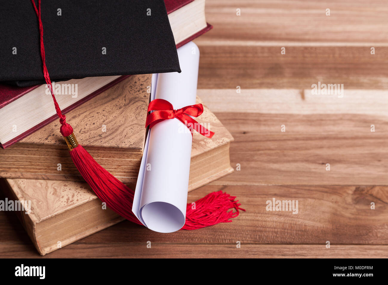 Diploma and books hi-res stock photography and images - Alamy