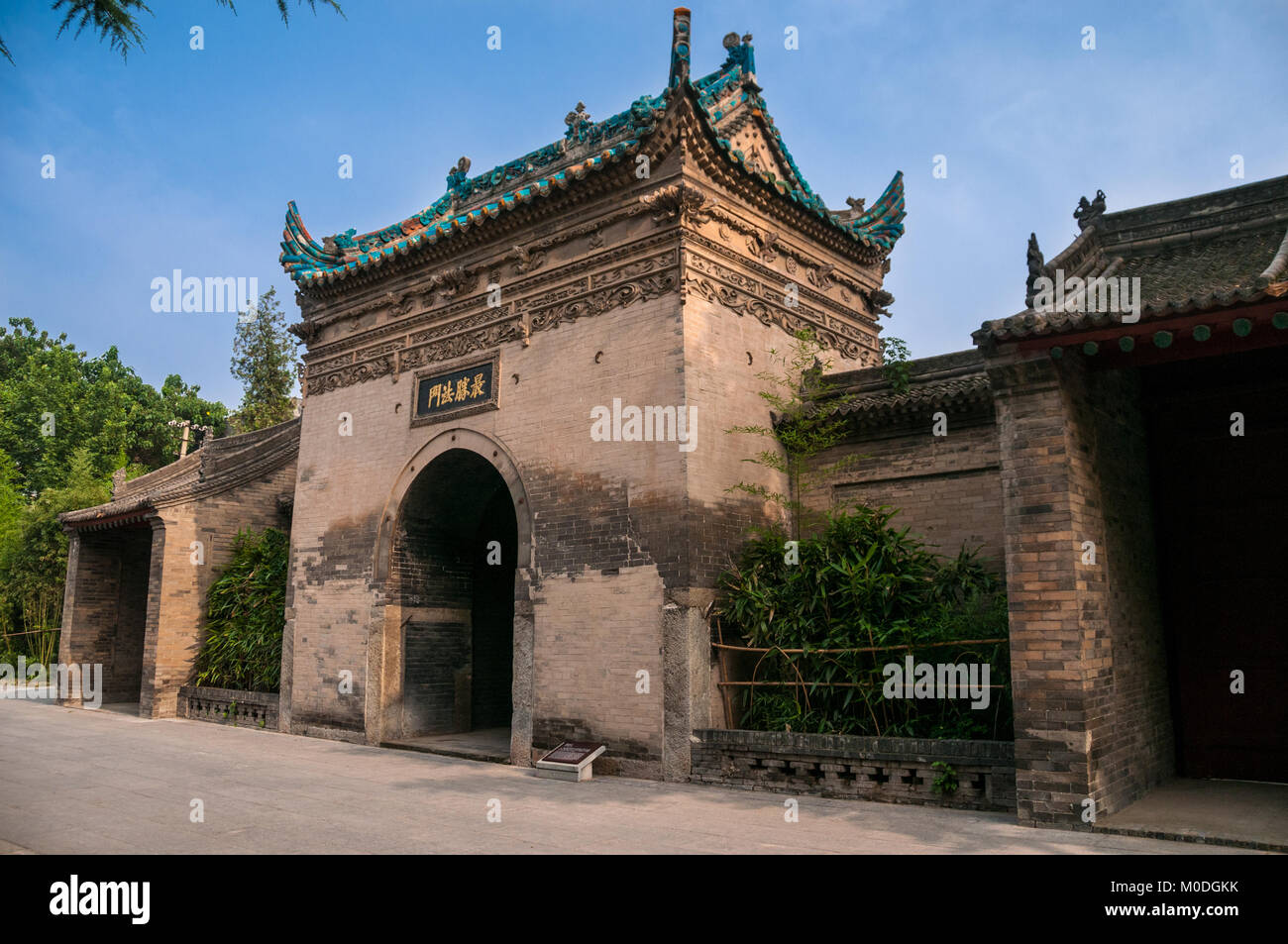 A gate in the grounds of the Little Wild Goose Pagoda in Xi’an, Shaanxi ...