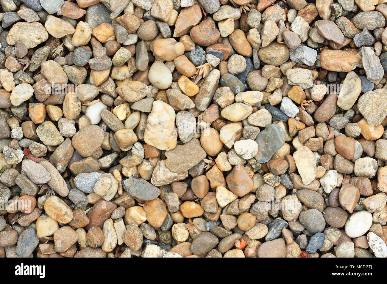 Small stones texture background Stock Photo - Alamy