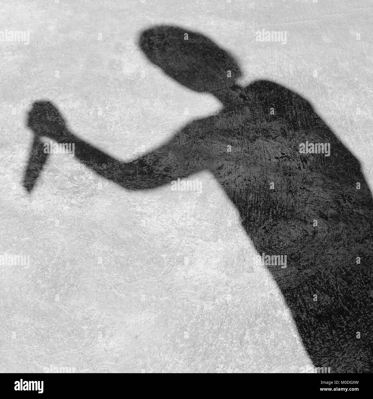 Male shadow figure knife Black and White Stock Photos & Images - Alamy