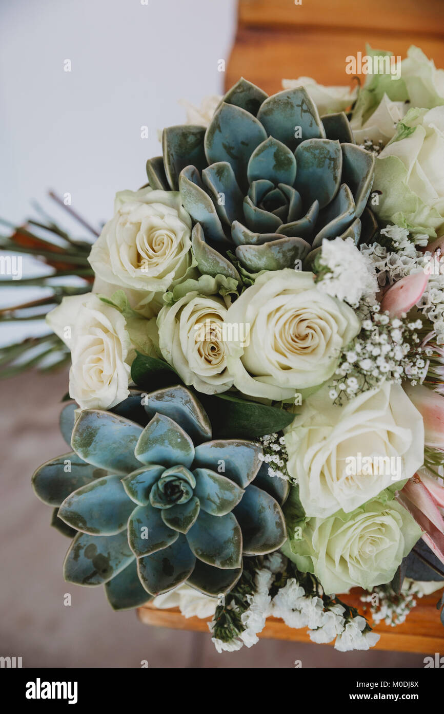 Rose and succulent bridal bouquet Stock Photo - Alamy