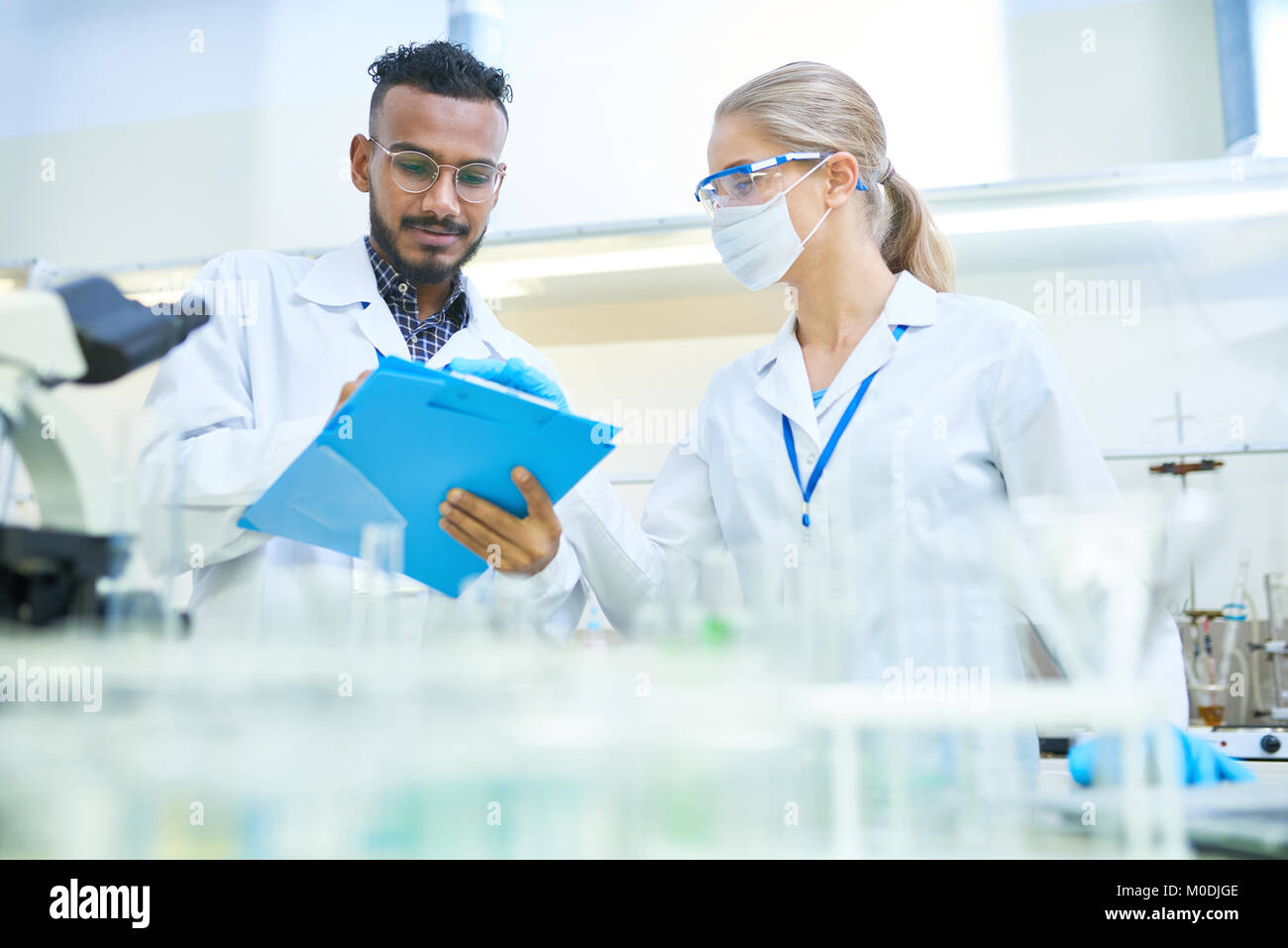 Young Scientists Working in Laboratory Stock Photo - Alamy