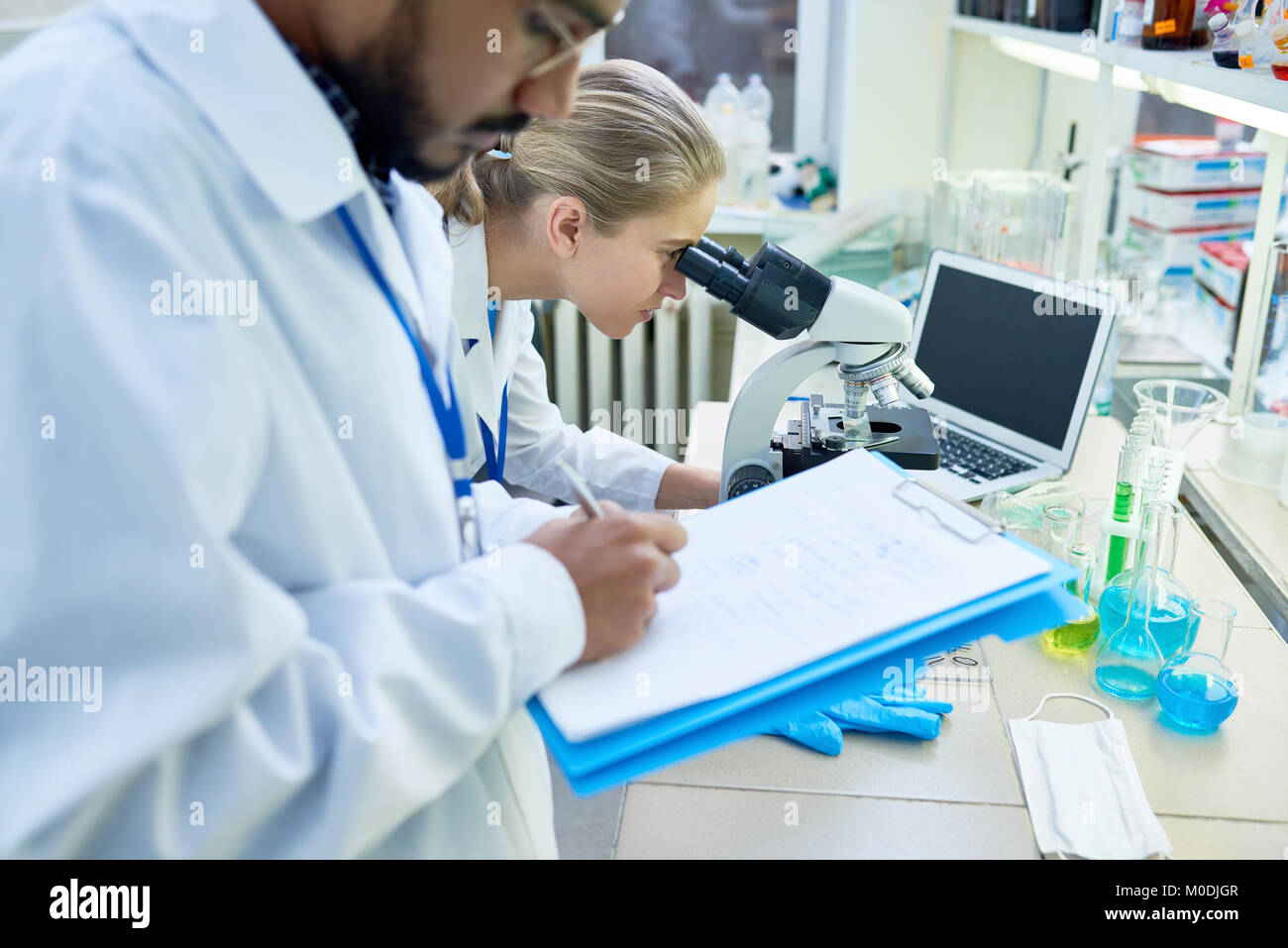 Scientific Research in Laboratory Stock Photo - Alamy