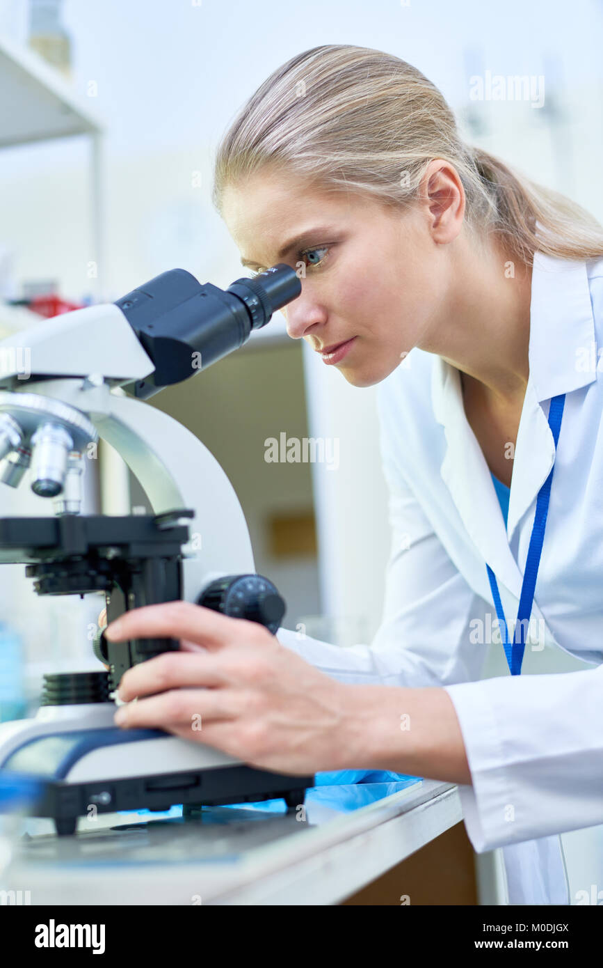 Female Scientist Using Microscope Stock Photo - Alamy
