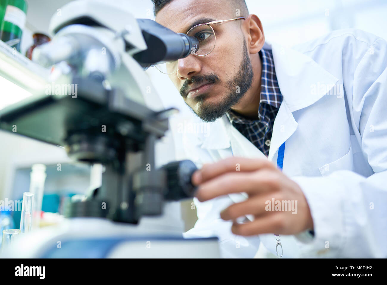 Scientist Using Microscope in Laboratory Stock Photo - Alamy Scientist Using Microscope in Laboratory Stock Photo - Alamy