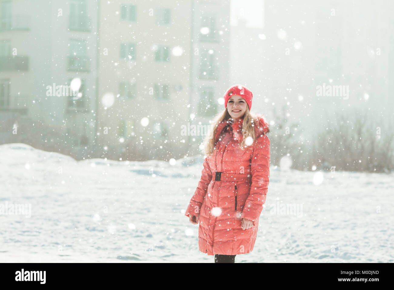Girl in red parka Stock Photo - Alamy